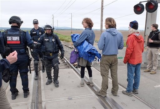 52 climate activists arrested in Washington railroad protest - Politics ...