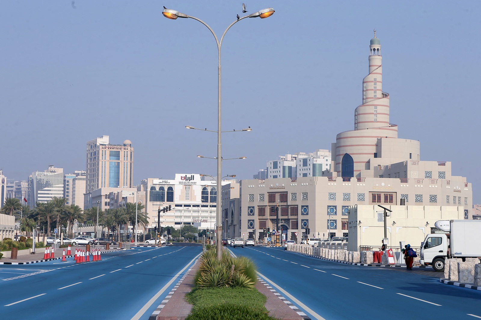 Feeling blue: Qatar road turned azure to cool city - Environment - The ...