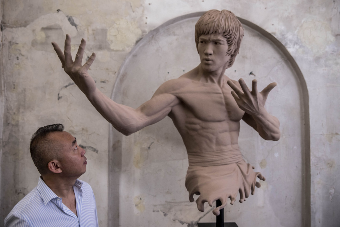 Martial arts superstar Bruce Lee's legacy endures 50 years on - Thu ...