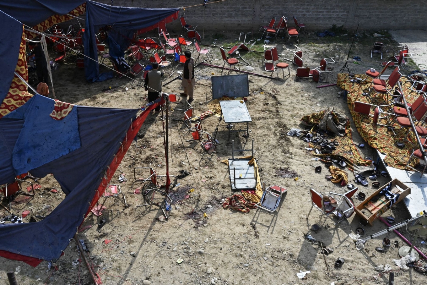 Pakistan police comb bomb site after deadly blast - Tue, August 1, 2023 ...