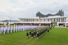 Readiness and respect: Soldiers stand at attention during the 79th Indpendence Day ceremony at the ceremonial field in Nusantara, East Kalimantan, on Aug. 17, 2024, the first time the future capital city hosted the Independence Day event.