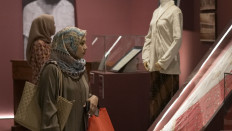 Visitors observe ‘kebaya’ (traditional blouse), textiles and other objects displayed on April 21, 2025, in Sunting: Jejak Perempuan Indonesia Penggerak Perubahan (Edit: Footprints of Indonesian women as drivers of change), an exhibition to commemorate Kartini Day that runs until July 31 at the National Museum in Central Jakarta. (Courtesy of National Museum)