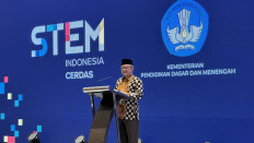 Elementary and Secondary Education Minister Abdul Mu'ti delivers a speech on May 28 during the launch of the STEM Indonesia Cerdas initiative to provide skills on artificial intelligence and STEM in Jakarta. The iniative aims to reach some 10 million students from 500 schools and is a collaboration by several ministries and the Riady Foundation.