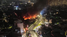 Devastating loss: Fire rages through Taman Puring Market on Monday evening in Kebayoran Baru, South Jakarta.