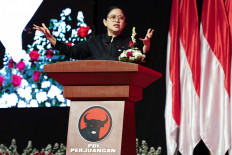 Indonesian Democratic Party of Struggle (PDI-P) executive Puan Maharani, who is also House of Representatives speaker, delivers her speech on July 30 during a two-day technical briefing for party-affiliated legislators in Denpasar, Bali.