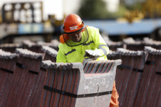 A worker sorts copper production at El Teniente mine, the world's largest underground copper mine in Machali, near Rancagua, Chile on April 2, 2025.